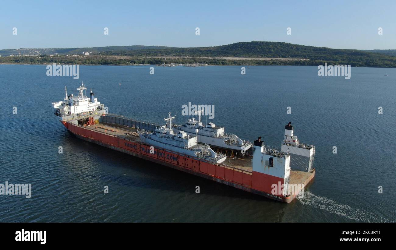 Aerial view of transport operation of two minesweepers ship to Bulgaria ...