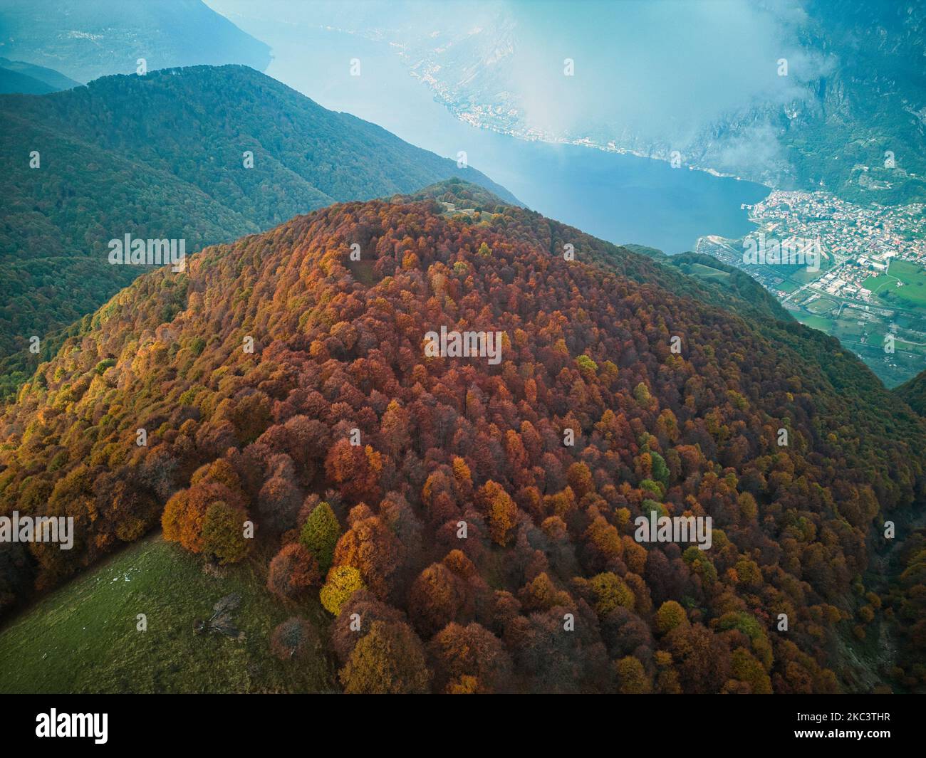 An aerial of Monte Galbiga mountain of Lombardy covered in autumn ...