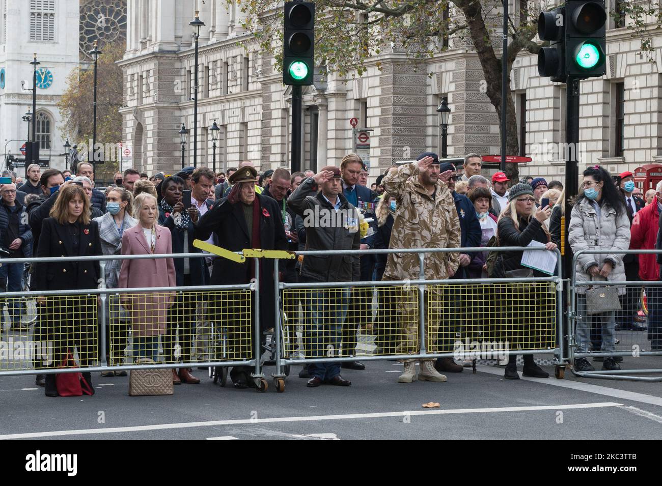 Veterans and members of the public observe two minutes silence as part ...