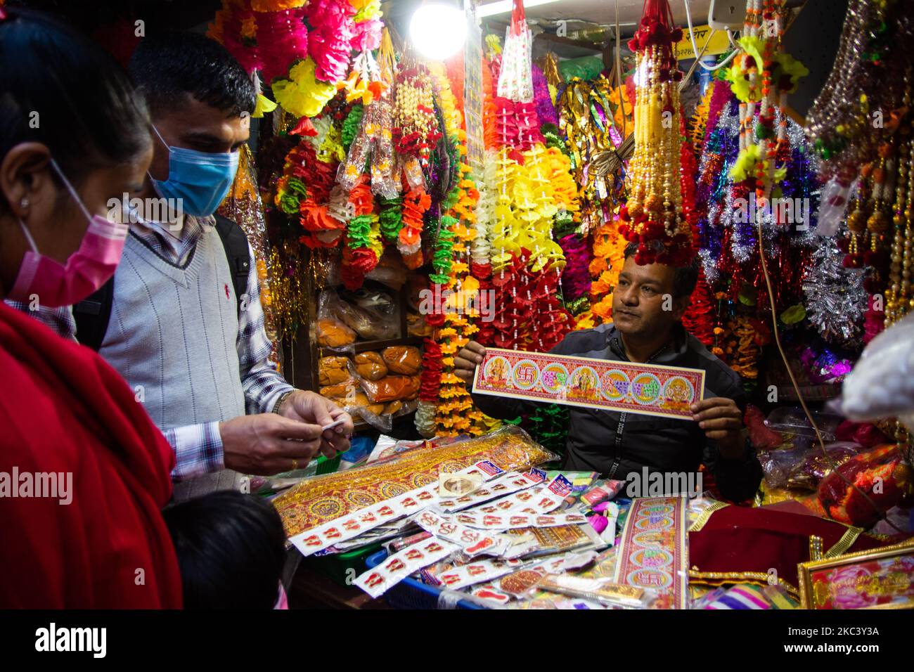 Nepalese people buy poster of Goddess Laxmi for the upcoming Tihar ...