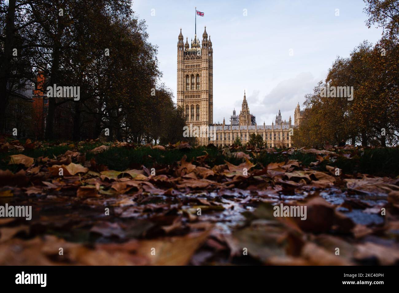 A Union Jack flag flies from the top of the Victoria Tower of the ...