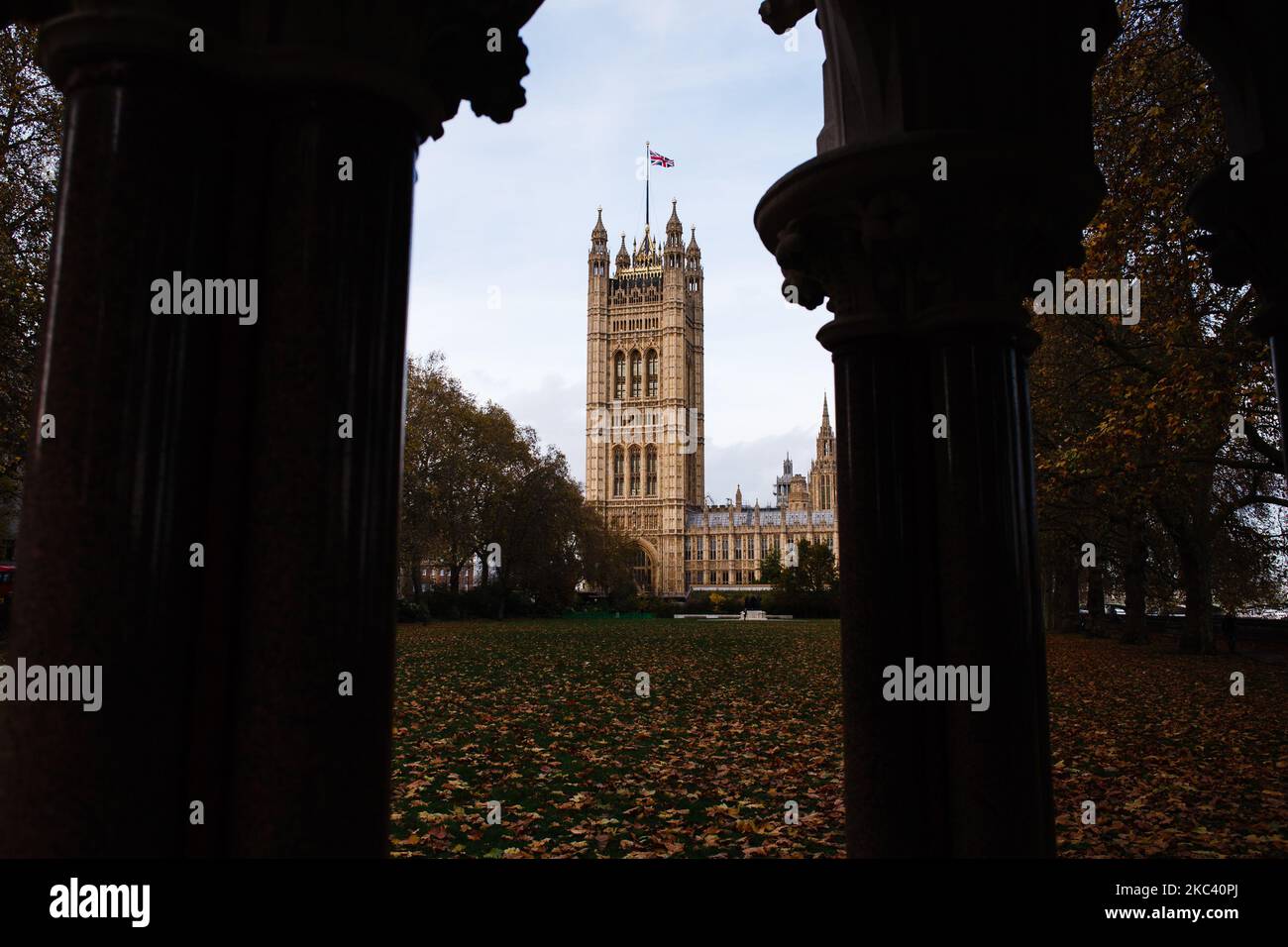 A Union Jack flag flies from the top of the Victoria Tower of the ...