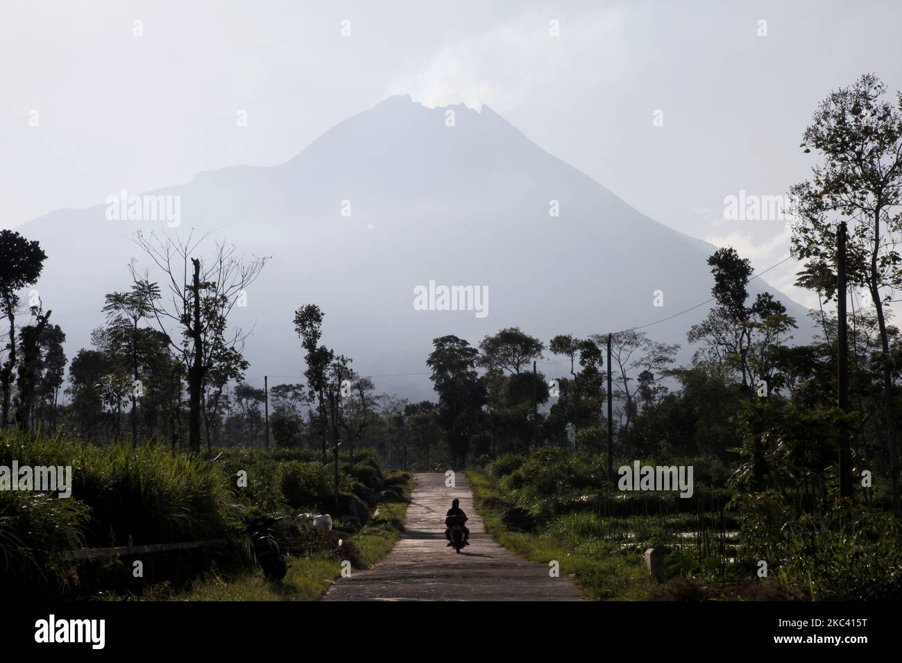 Local farmers carry out their activities in Tlogolele village, located ...
