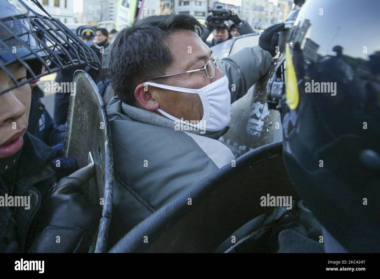 South Korean farmer protester arrest to riot police during an rice ...