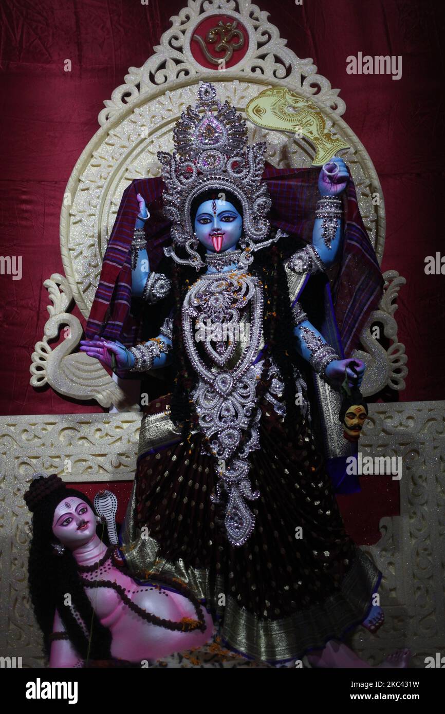 An idol of goddess Kali at a temple as hindu devotees celebrate Kali ...