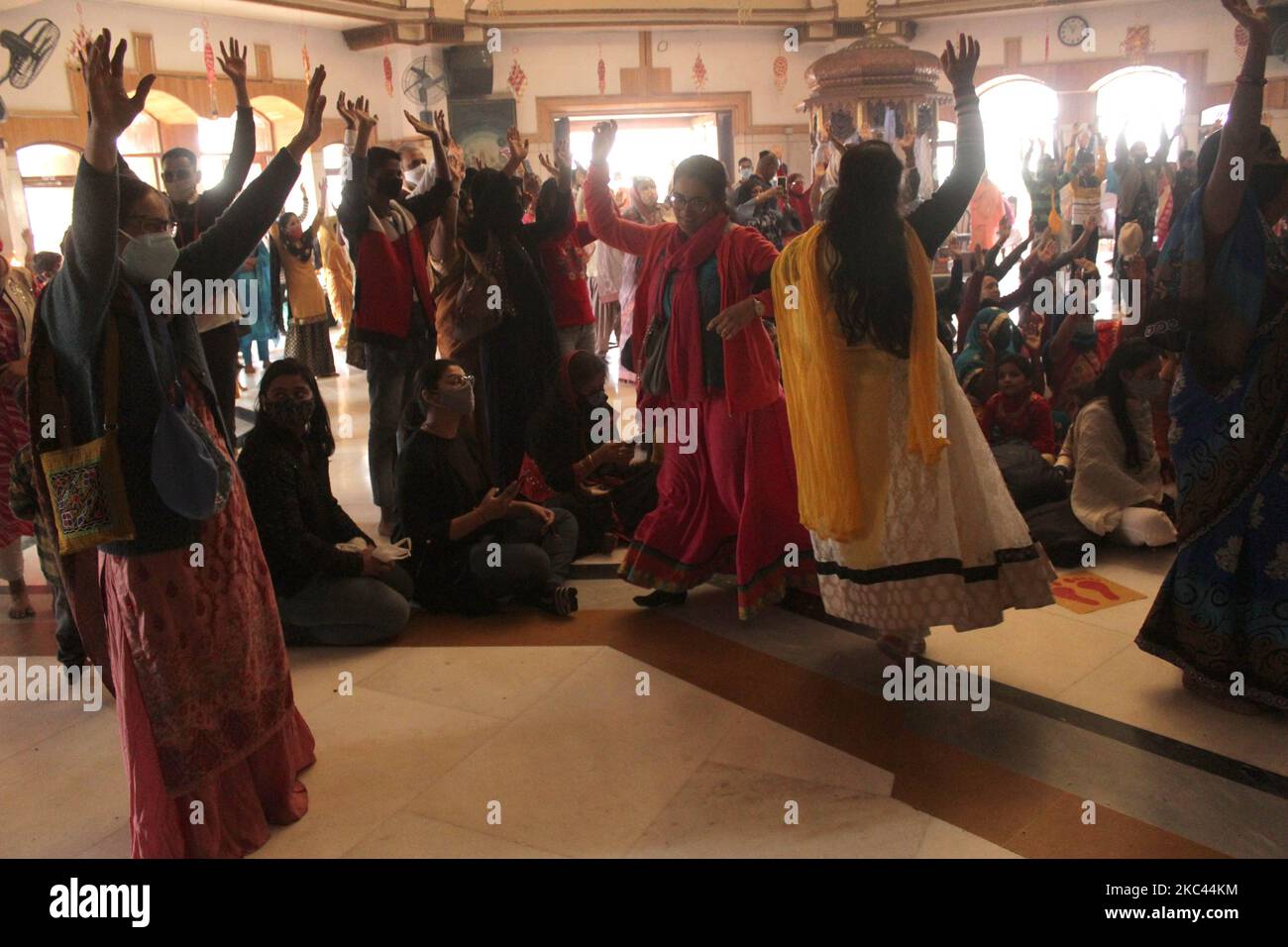 Devotees dancing and singing inside Iskcon temple during the 'Govardhan ...