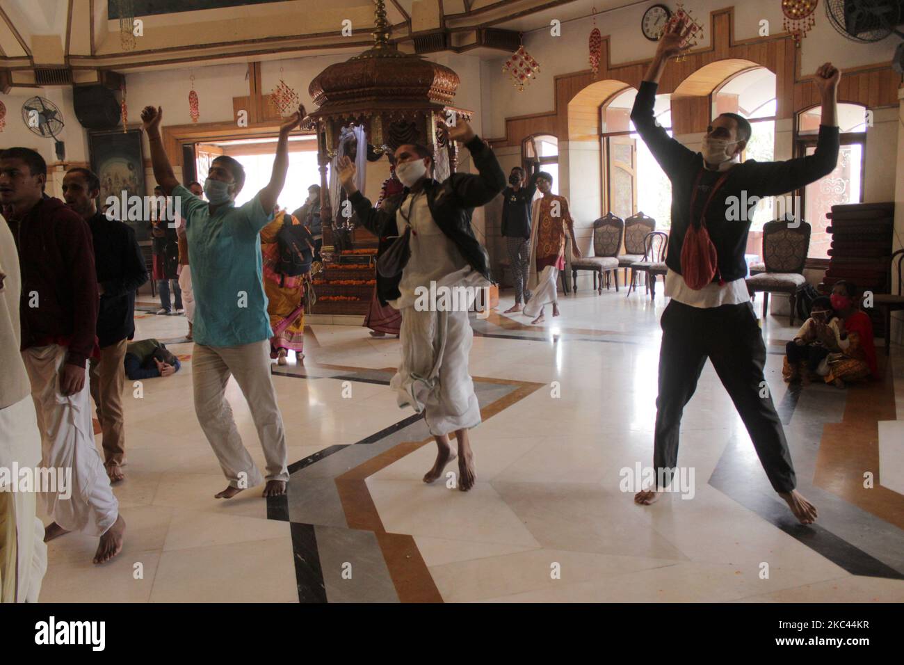 Devotees dancing and singing inside Iskcon temple during the 'Govardhan ...