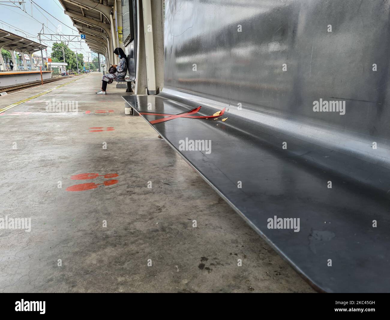 Health Protocol sign with social distancing at Commuter Line in Jakarta ...