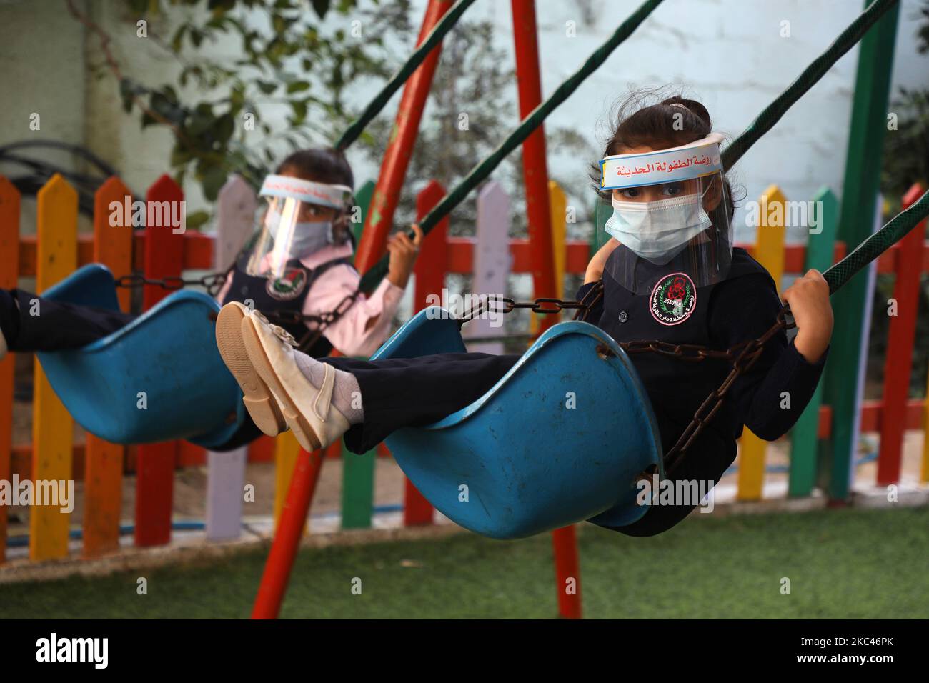 Palestinians school children, clad in masks and face-shields due to the ...