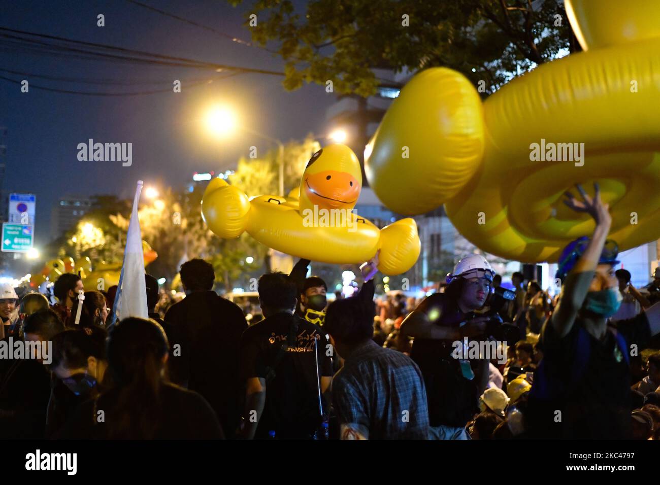 Pro-democracy protesters move inflatable rubber ducks during an anti ...