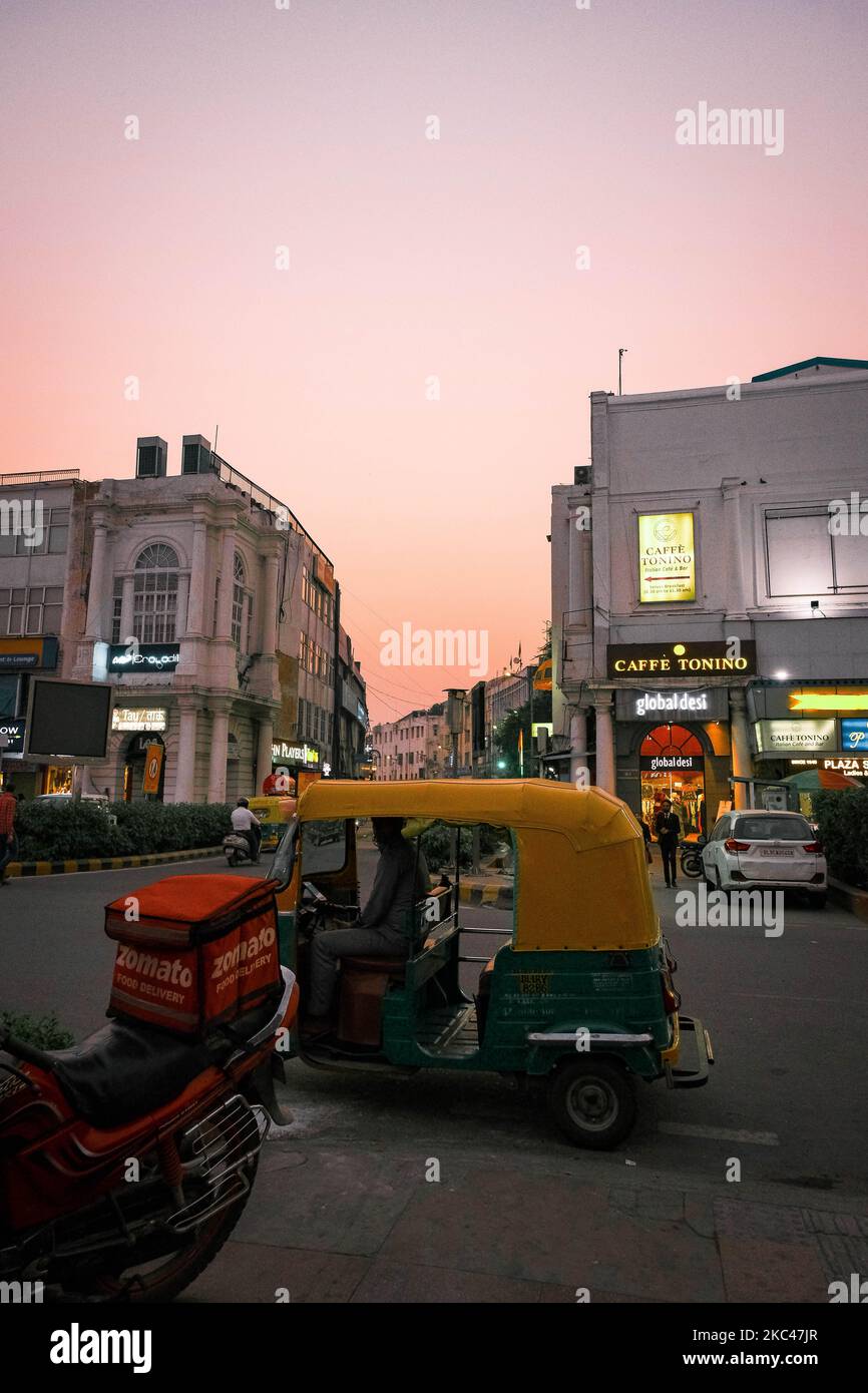 A Auto rickshaw in Connaught street at sunset, Delhi, India, Vertical ...