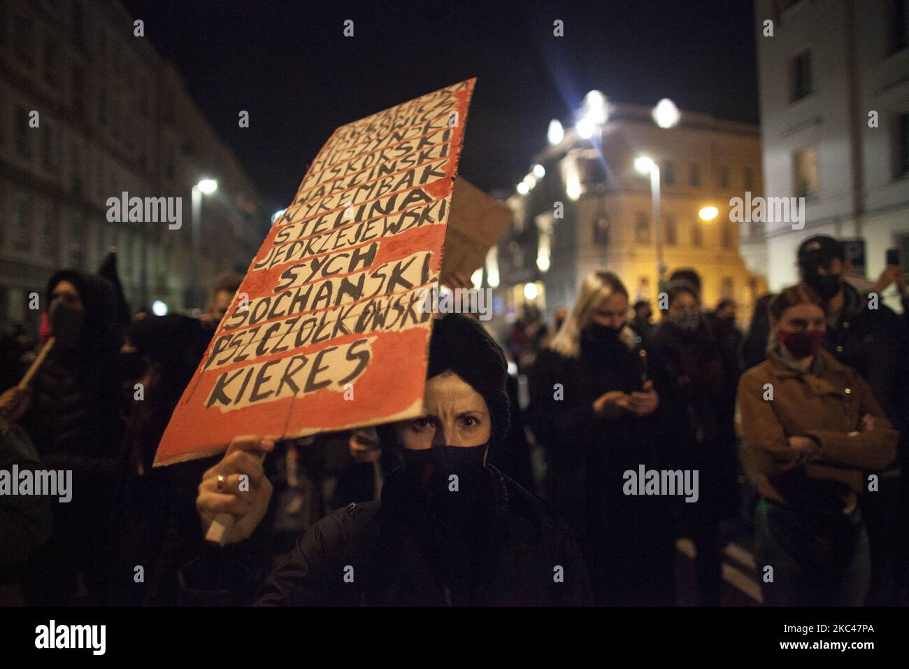 Woman holds a list of Constitutional Court judges during blockade of ...