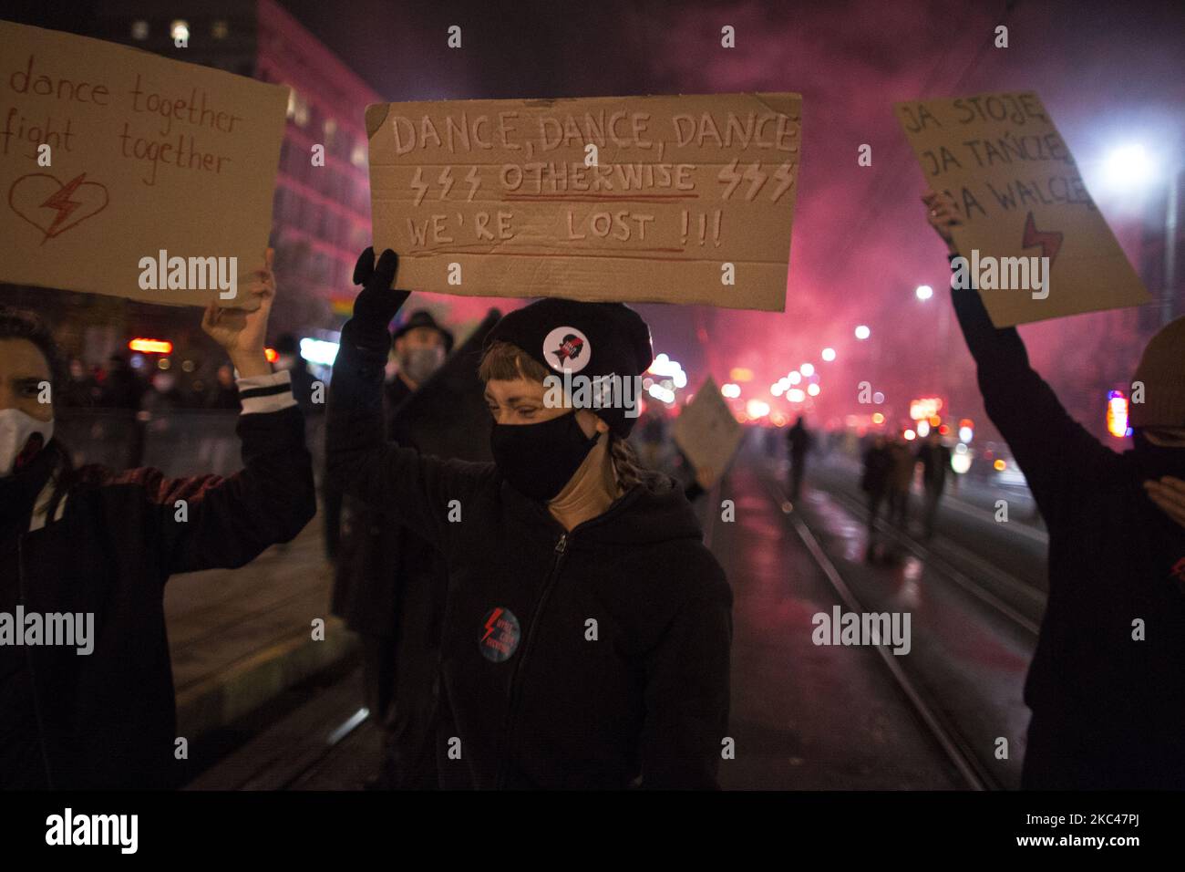 Woman hold Dance Otherwise We Re Lost banner during blockade of ...