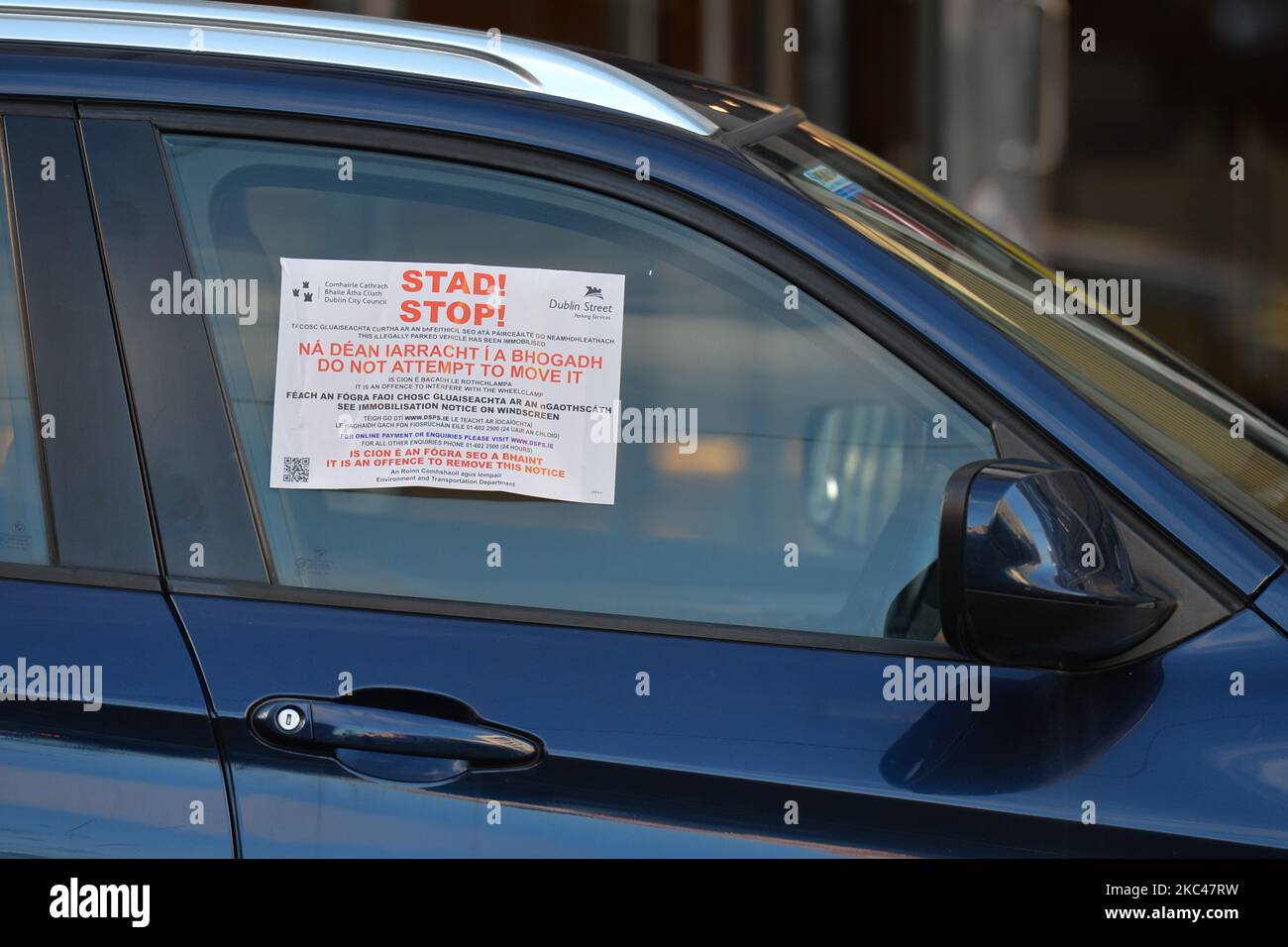 Wheel clamp sticker warning hi-res stock photography and images - Alamy