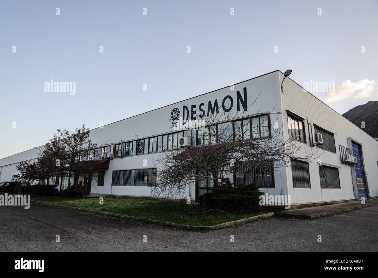 An outdoor view of the industrial shed of the Italian company Desmon ...