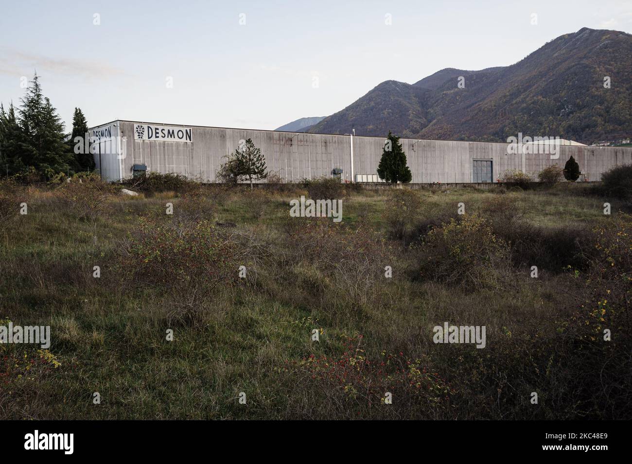 An outdoor view of the industrial shed of the Italian company Desmon ...