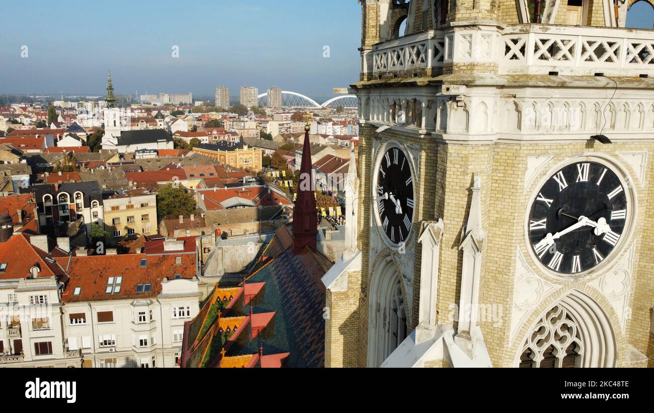 An aerial view of an old architectural building with a clock on a tower ...