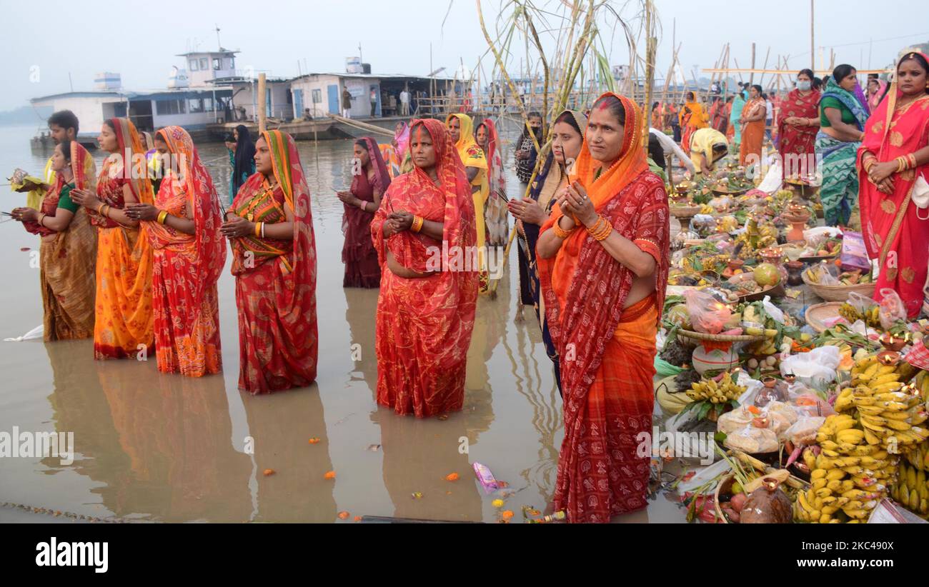 Hindu devotees offer prayers during the Chhath Puja Festival on the ...