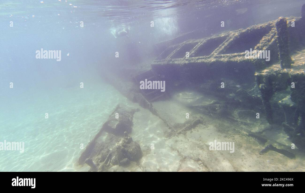 Underwater images in the Aegean Sea of the old rusty shipwreck in ...