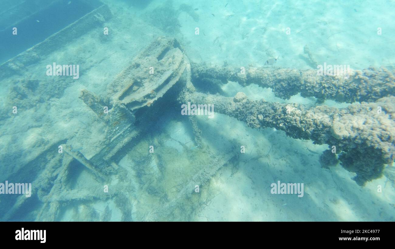 Underwater images in the Aegean Sea of the old rusty shipwreck in ...