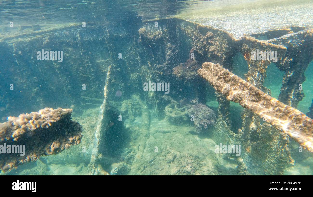 Underwater images in the Aegean Sea of the old rusty shipwreck in ...