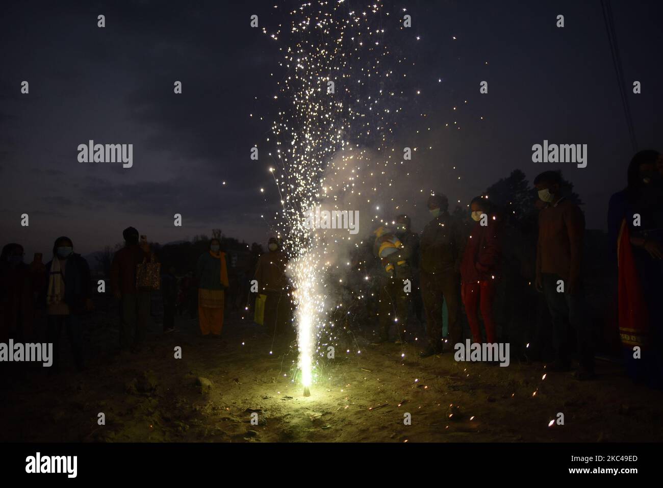 Little Kids burning fire crackers during chhath puja festival on bank ...