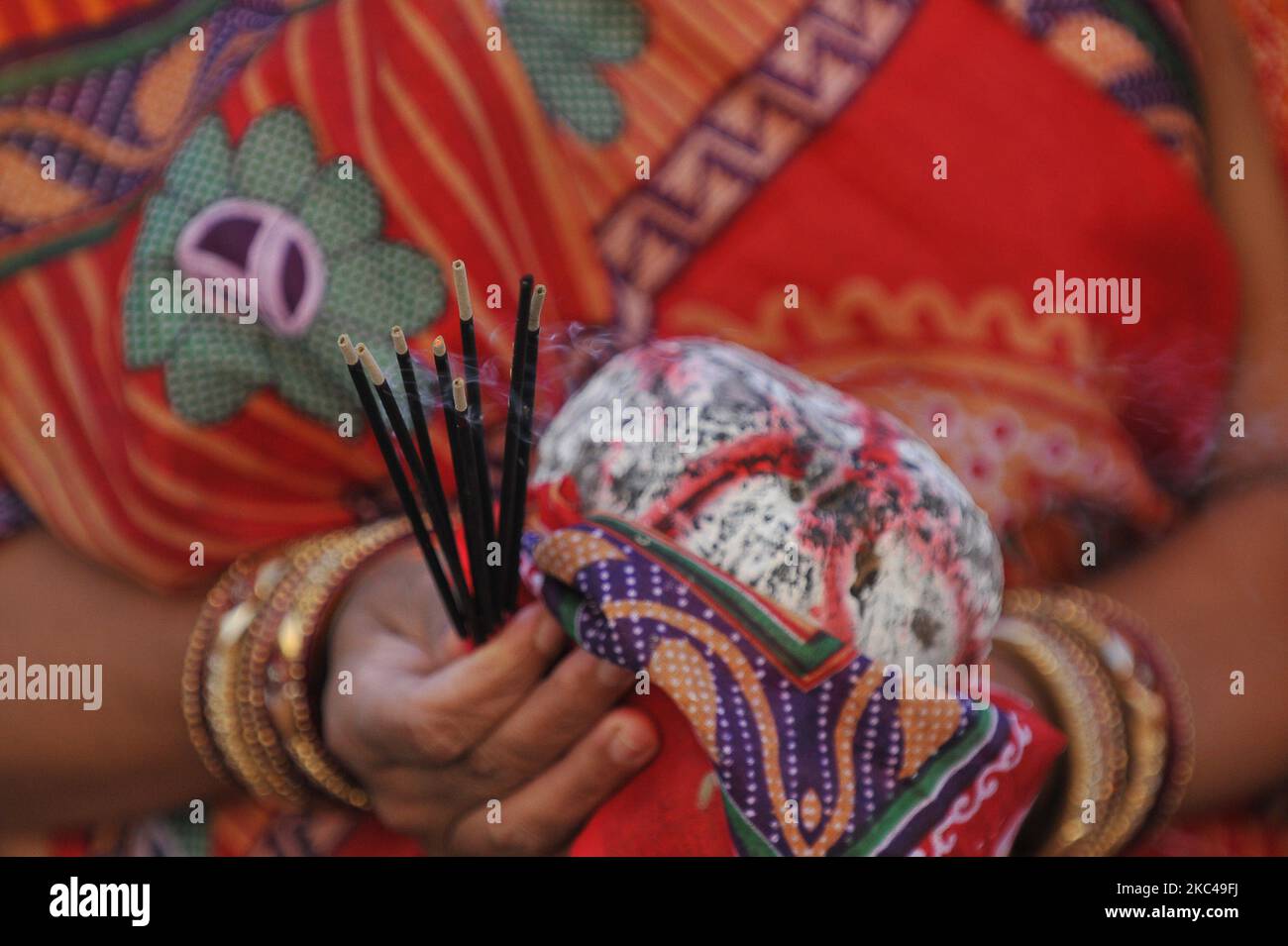 A Nepalese Devotee offering ritual prayer during Chhath Puja Festival ...