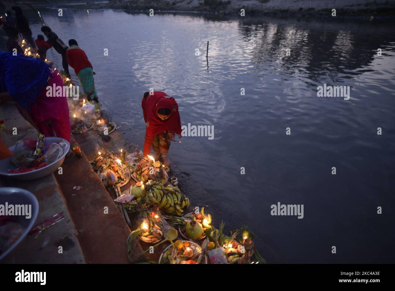 Devotee lit oil lamps hi-res stock photography and images - Alamy