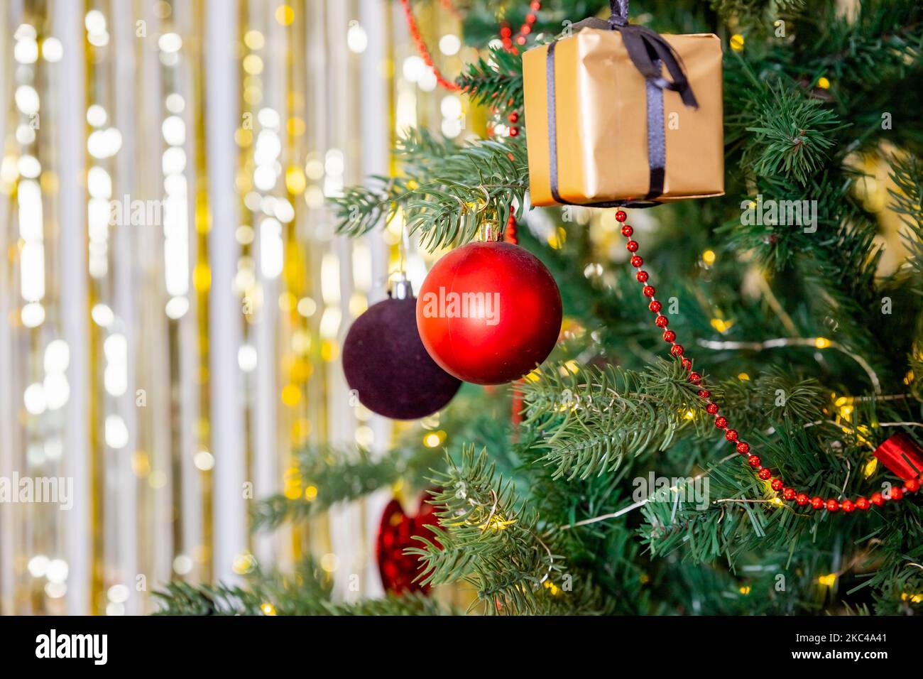 Beautiful color christmas decorations hanging on christmas tree with ...
