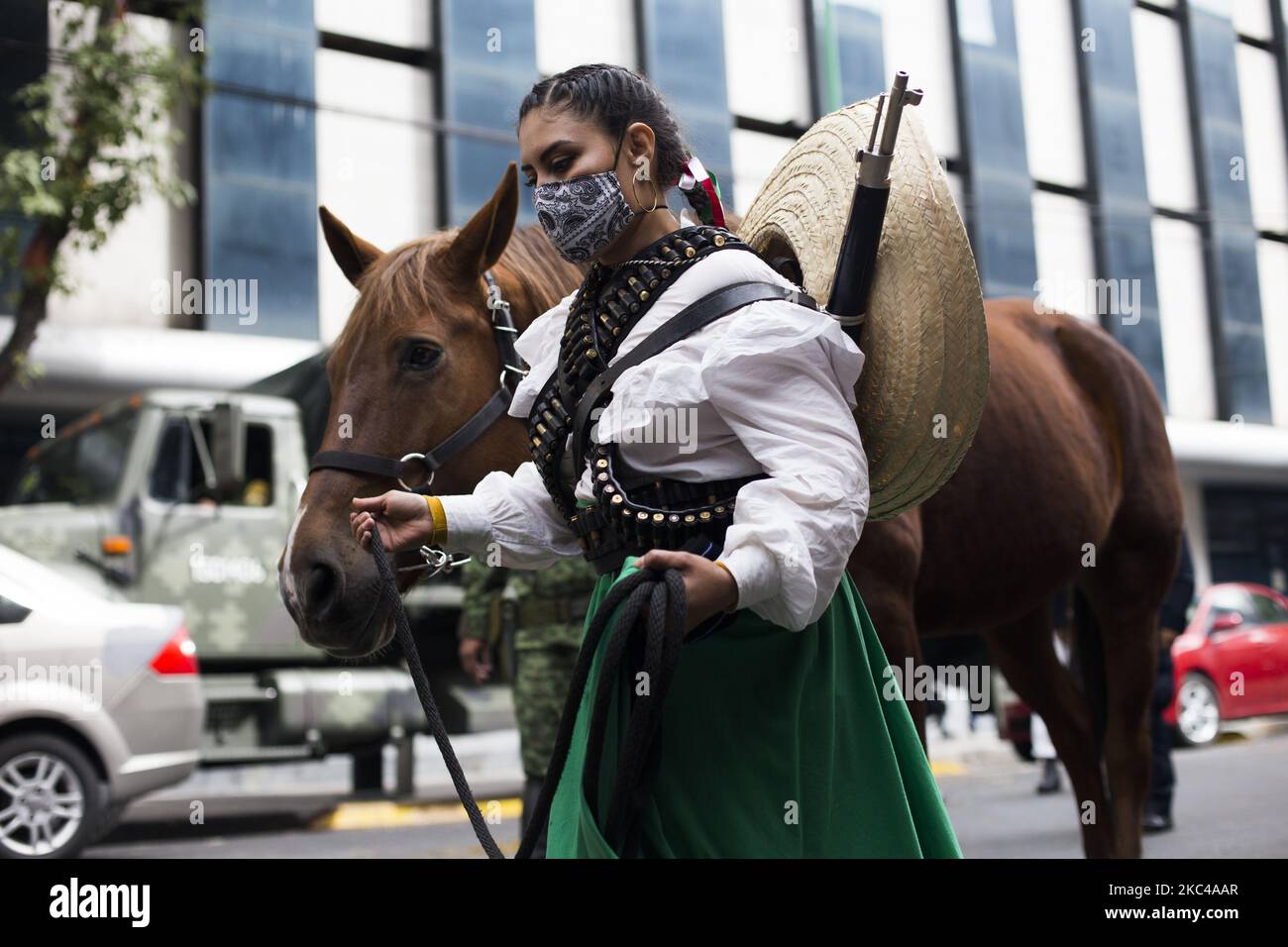 Actresses and actors disguised as characters from the Mexican ...