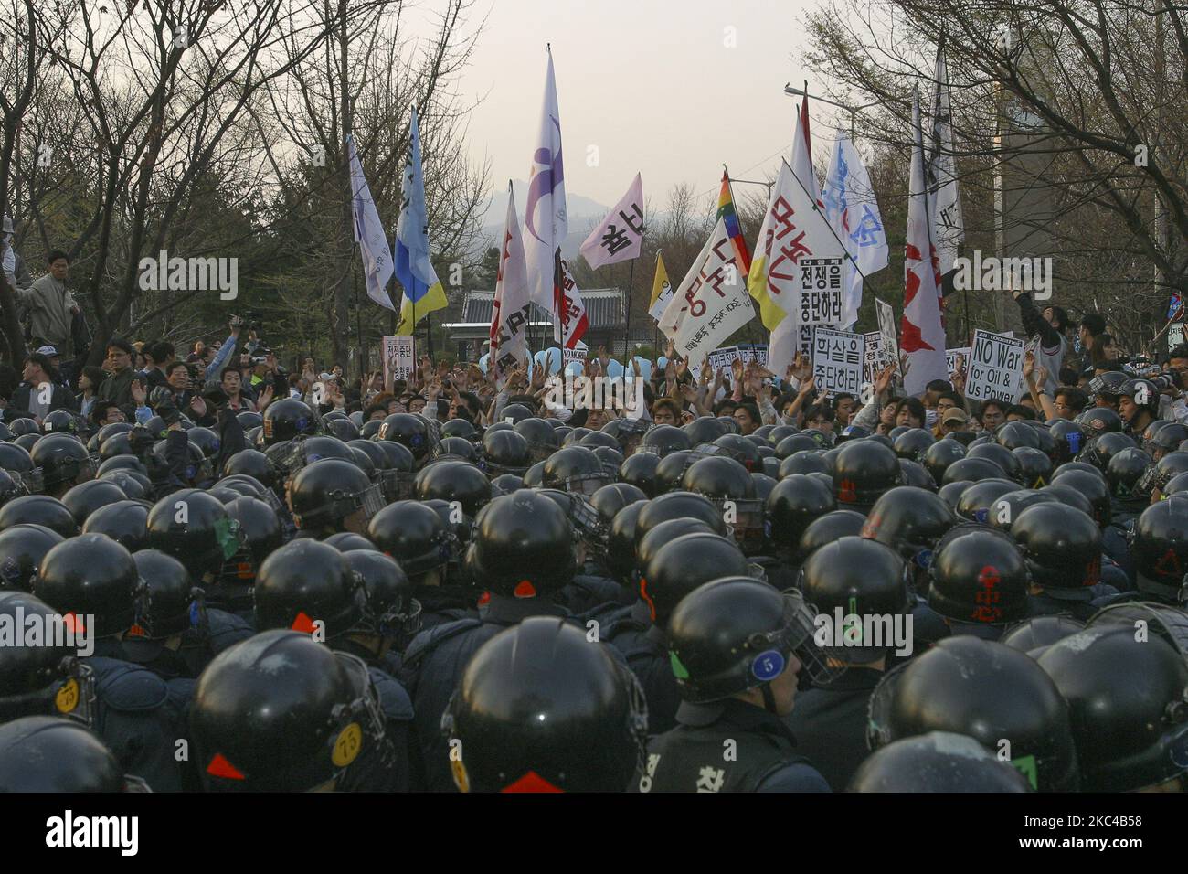 Protester and riot polices face toface before marching a anti-war rally ...