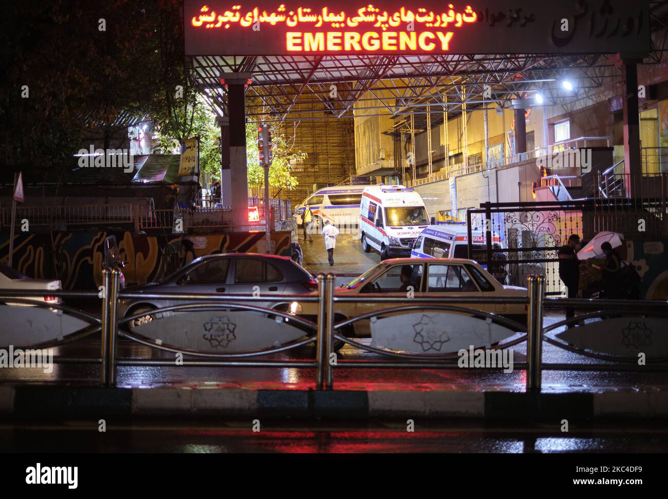 Ambulances are parked on an entrance of a hospital in northern Tehran ...
