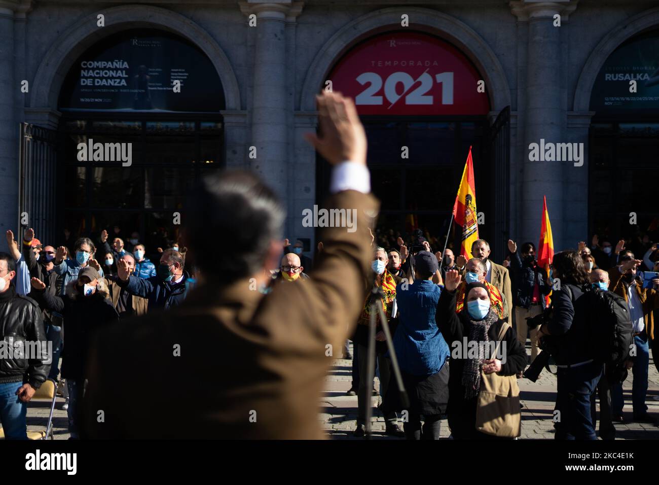 Franco supporters, raise their arms, making the fascist salute, when ...