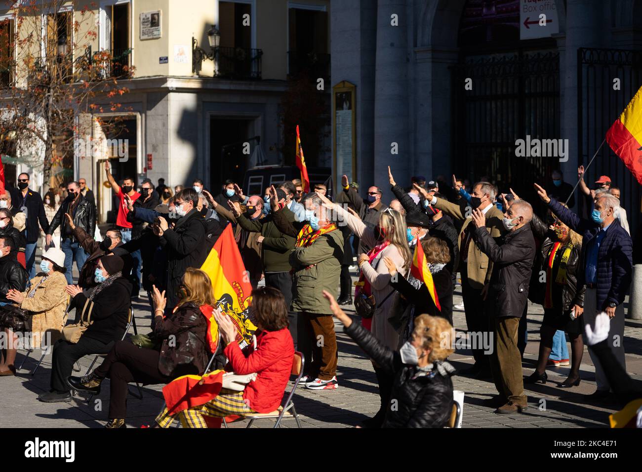 Franco supporters, raise their arms, making the fascist salute, when ...