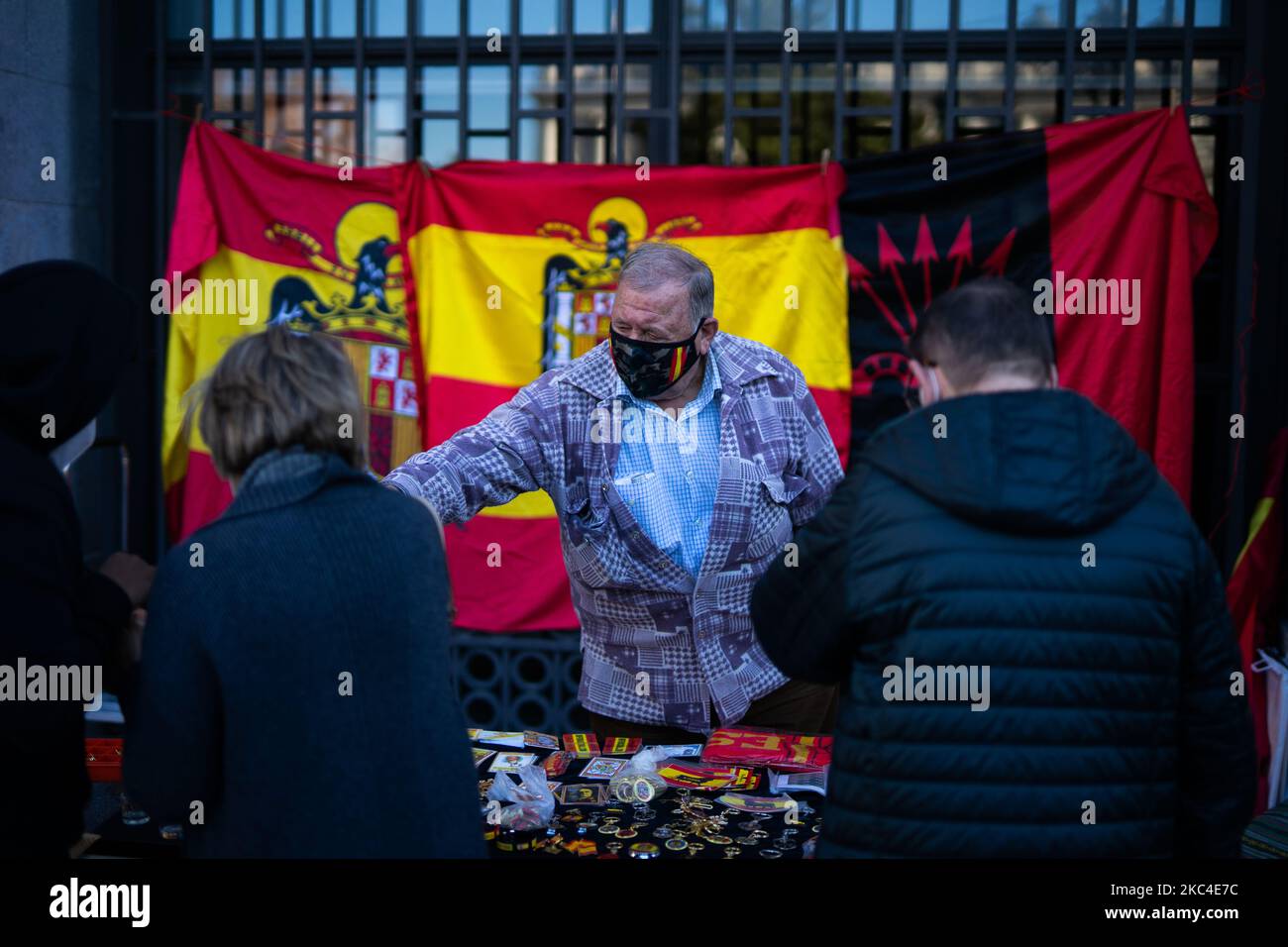 A stall sells Francoist objects and flags during the rally and act that ...