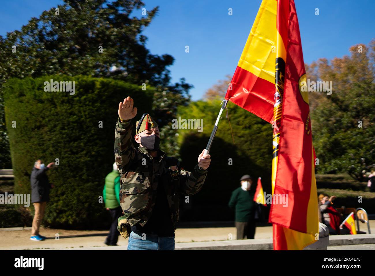 Franco supporters, raise their arms, making the fascist salute, when ...