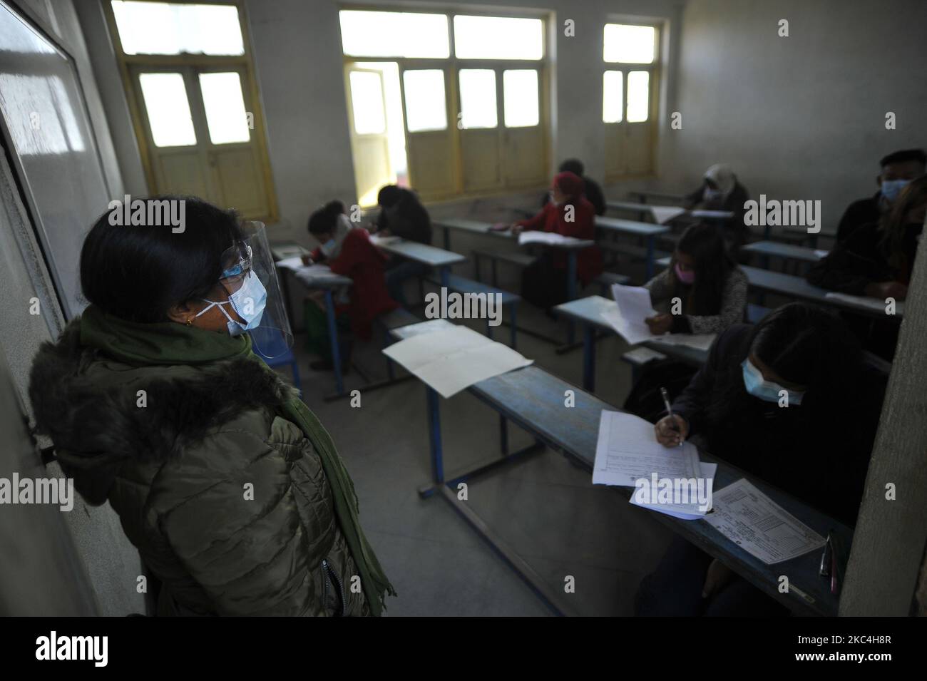 Nepalese students giving board Exam in Mangal Secondary School, as ...