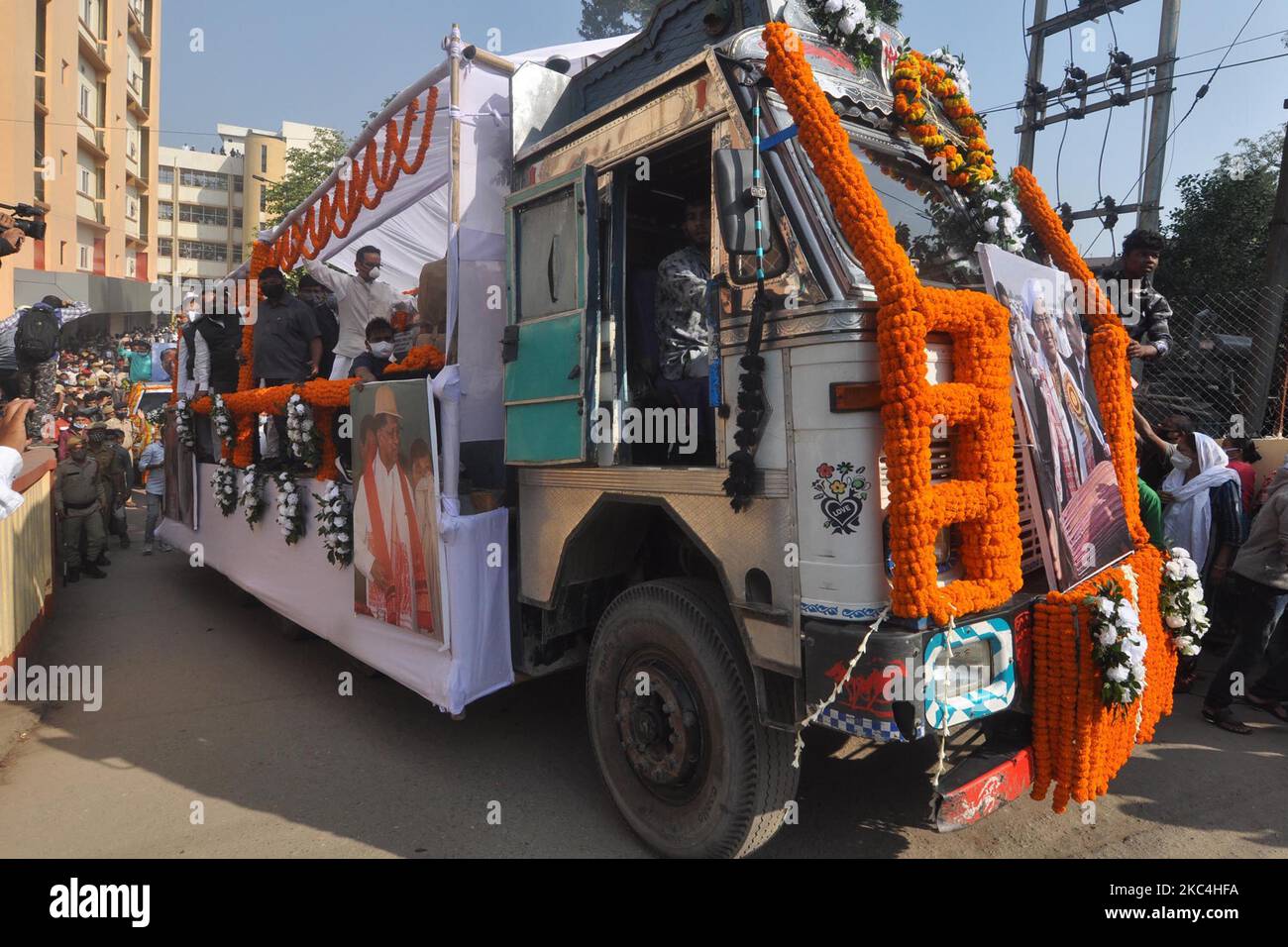 A vehicle carrying the mortal remains of former Assam chief minister ...