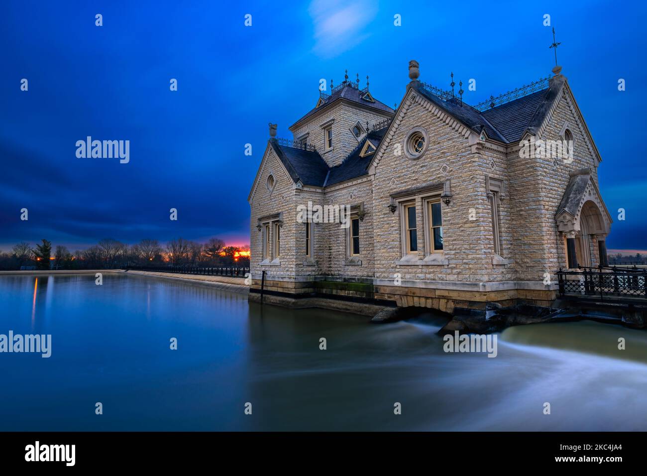 An aerial view of Crescent Hill Reservoir surrounded by buildings in ...