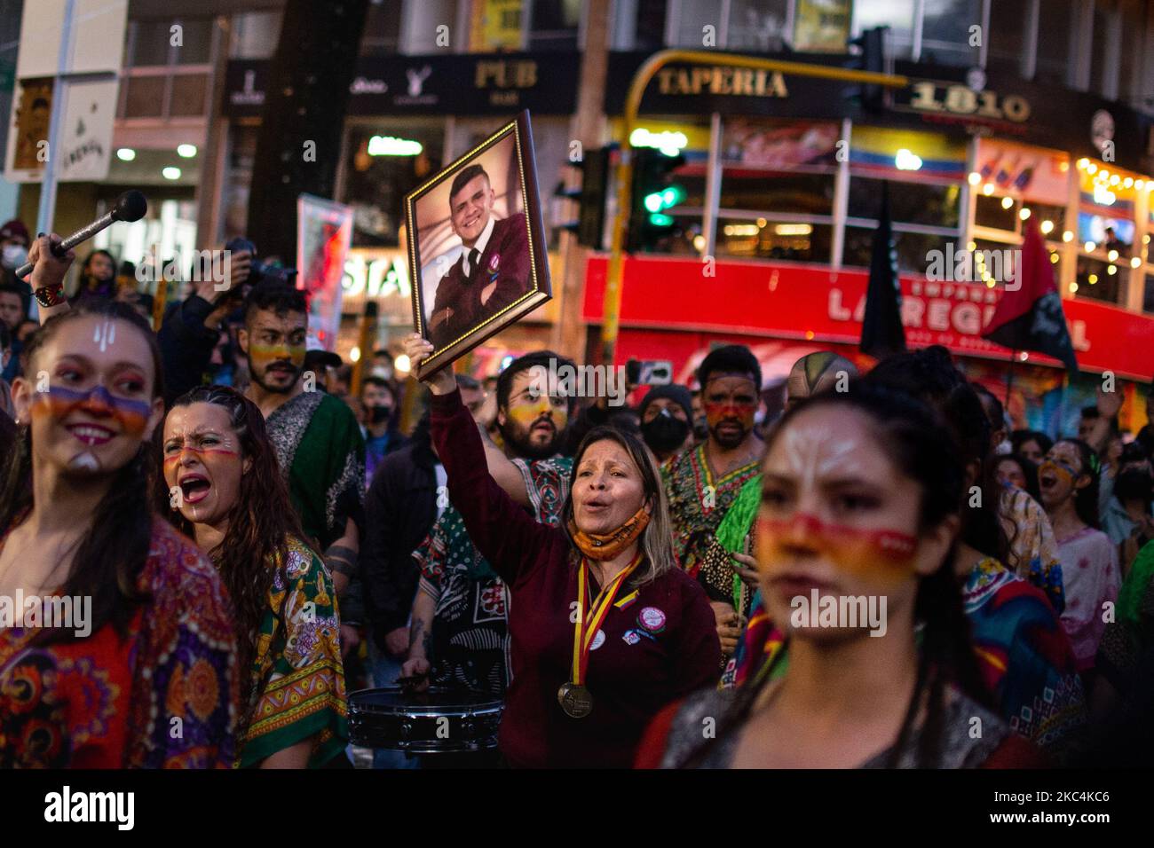 People take part in a demonstration for the anniversary of the death of ...