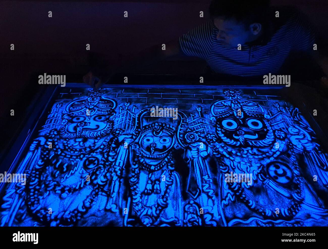A sand animation of Indian God Lord Jagannath, Balabhadra and Devi ...