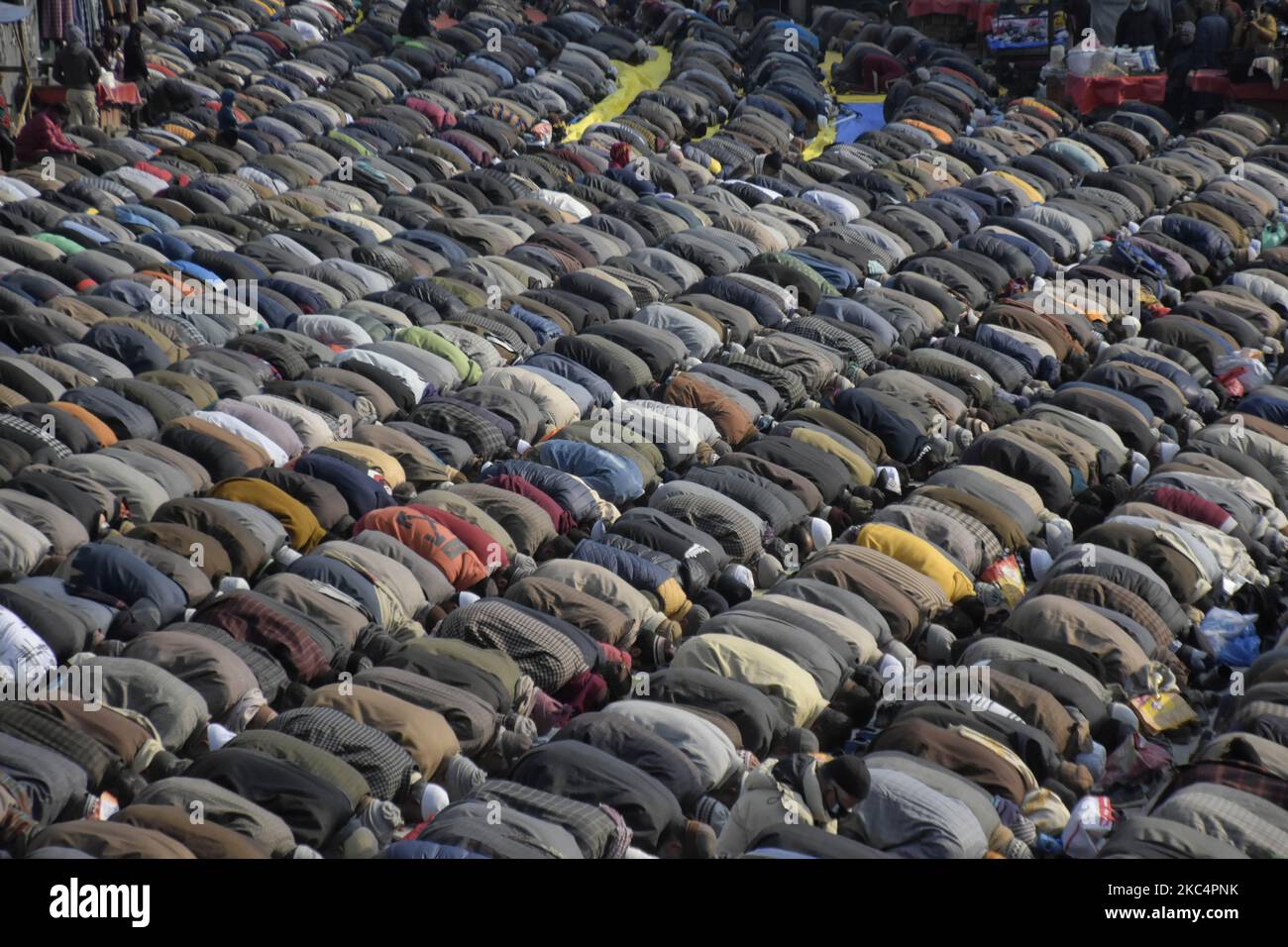 People pray outside Khanyar shirine on the eve of urs of Sheikh Abdul ...