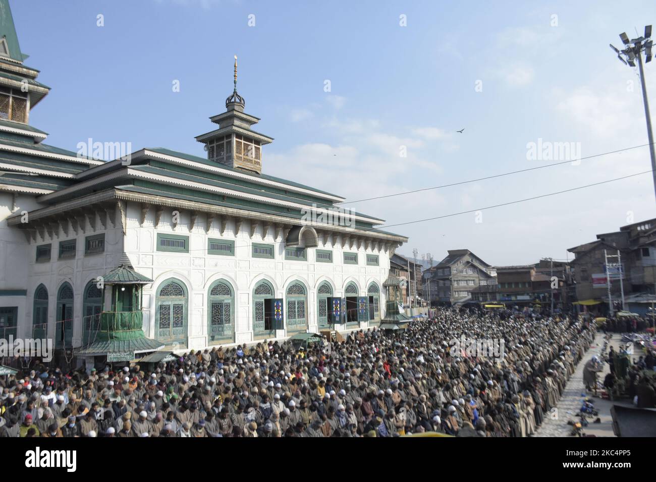 People pray outside Khanyar shirine on the eve of urs of Sheikh Abdul ...