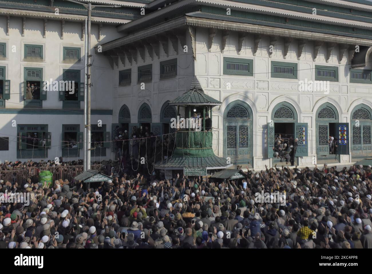 People pray outside Khanyar shirine on the eve of urs of Sheikh Abdul ...