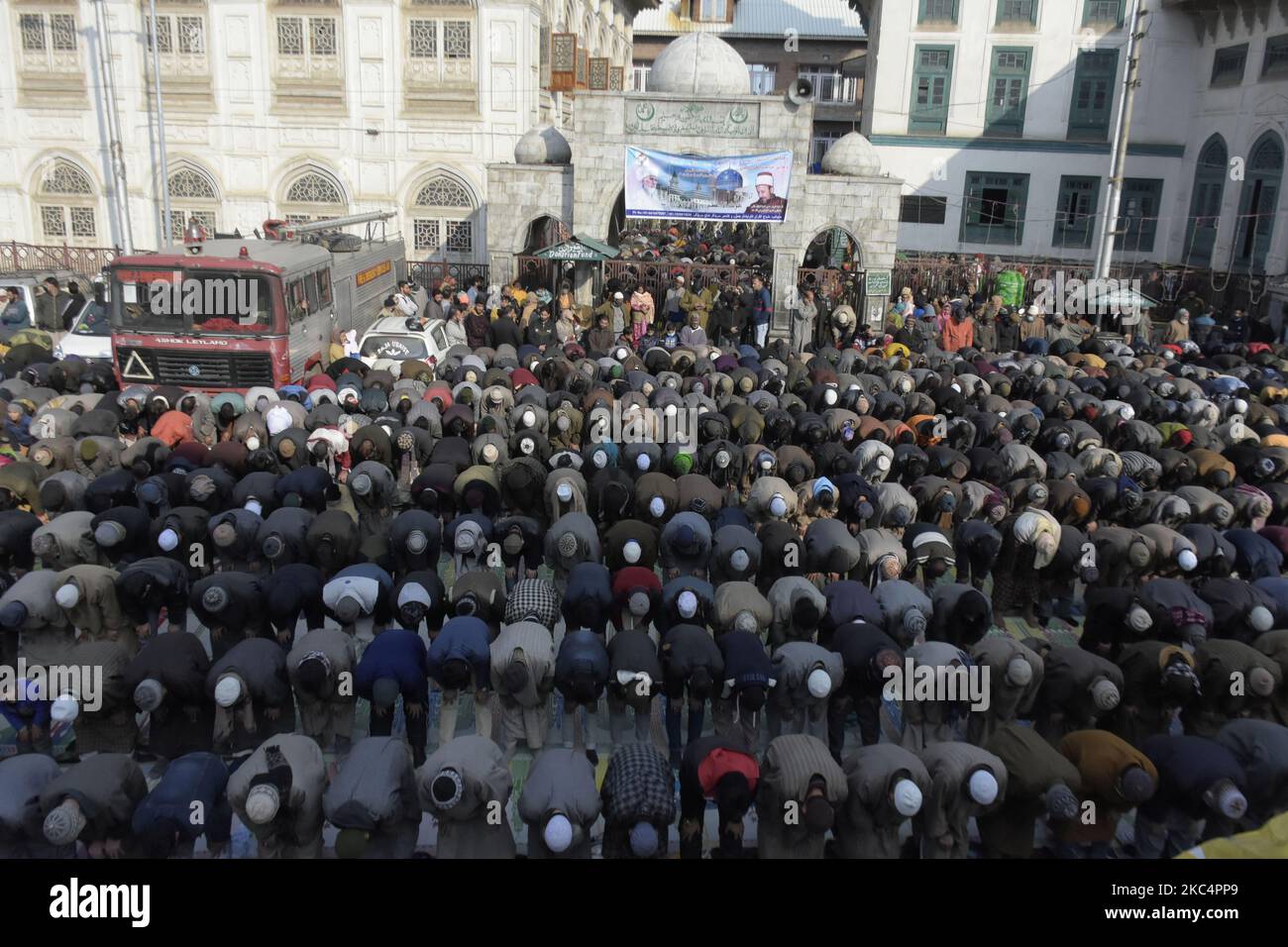 People pray outside Khanyar shirine on the eve of urs of Sheikh Abdul ...