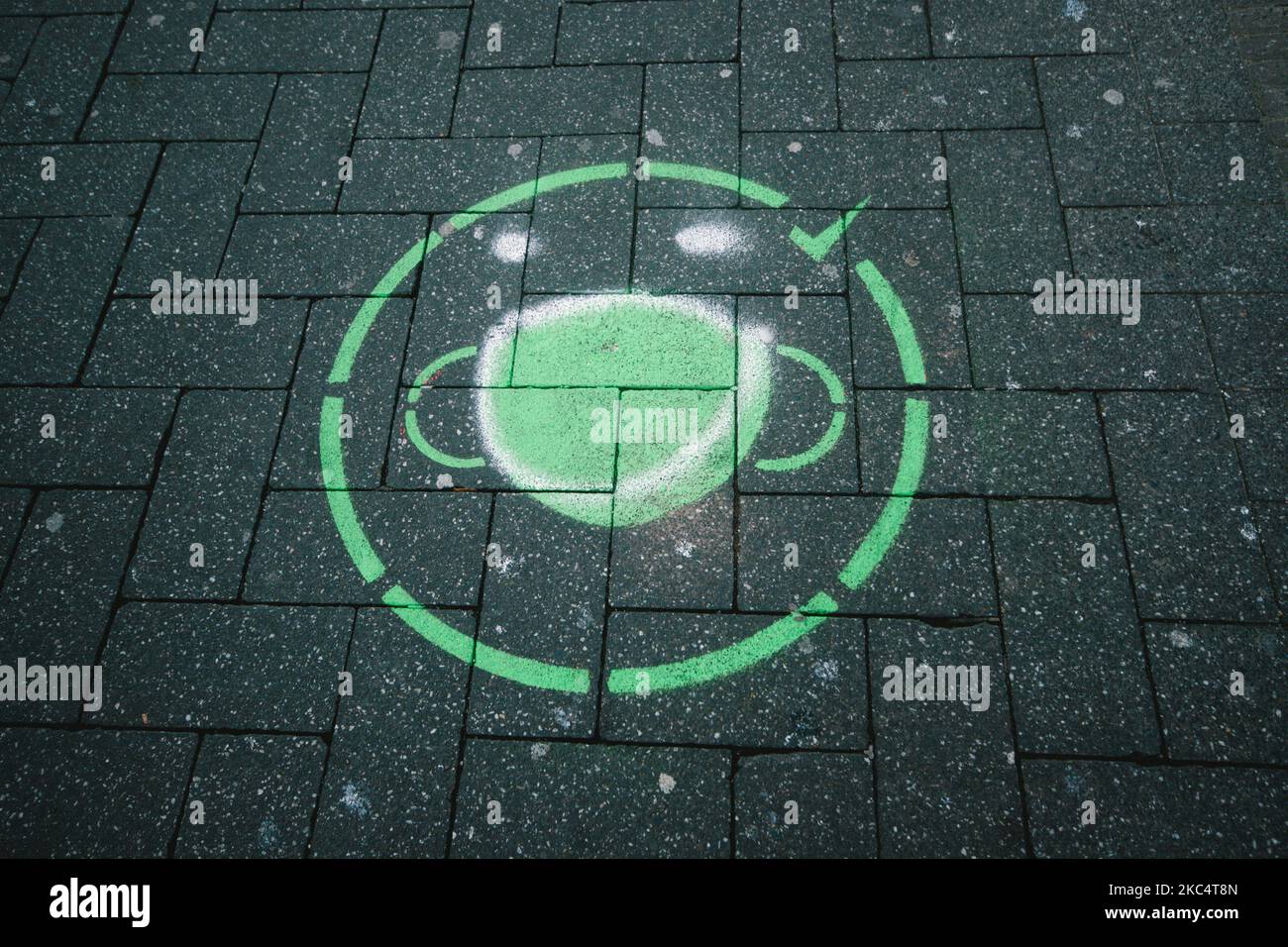 a painting of smiling face is painted on top of face mask paint in the ...