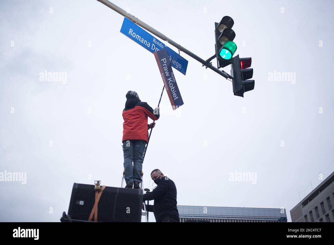 Protester change name of Roman Dmowski rondo to Womans Rights Rondo ...