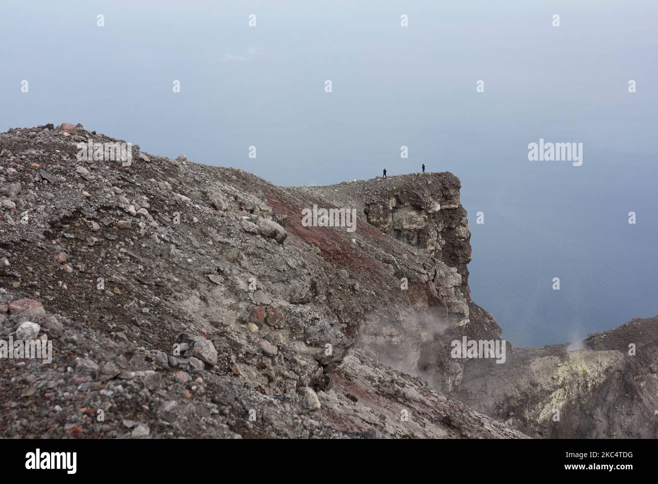 Sulfur smoke and rocks on the top of Mount Gamalama, Ternate city ...