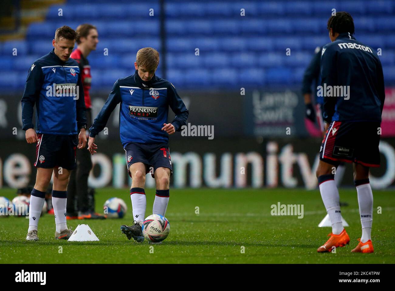 Boltons Ronan Darcy warms up with team mates during the Sky Bet League ...
