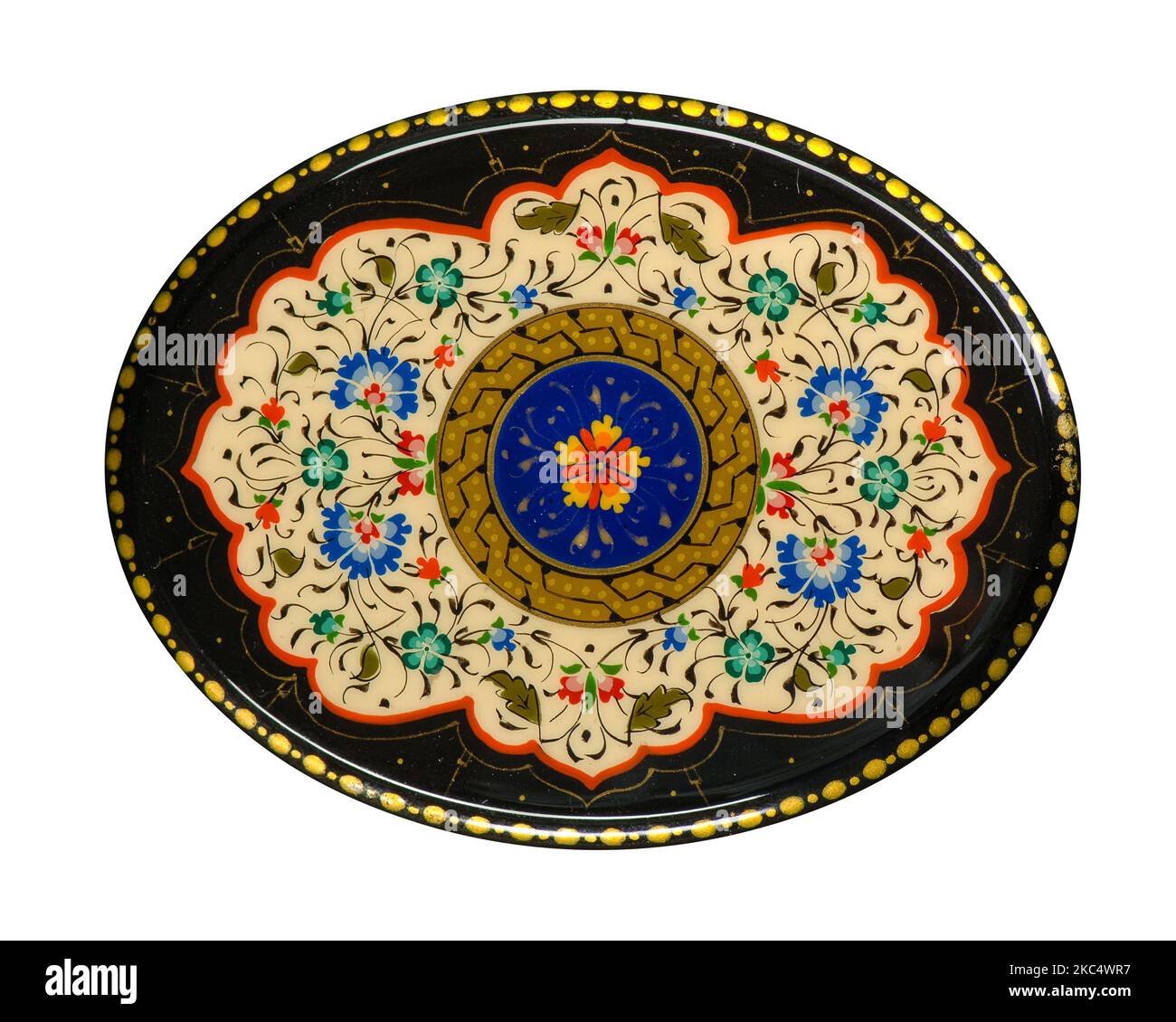 A closeup of a round casket with an artistic painting on a white ...